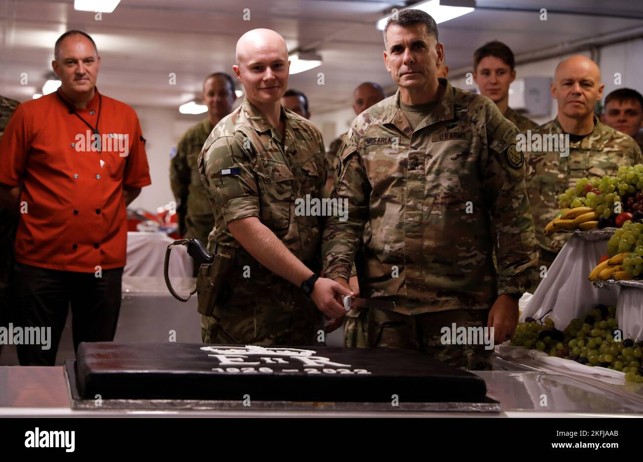 British Army Lance Cpl. Doherty and U.S. Army Maj. Gen. Matthew McFarlane, commander of Combined ...