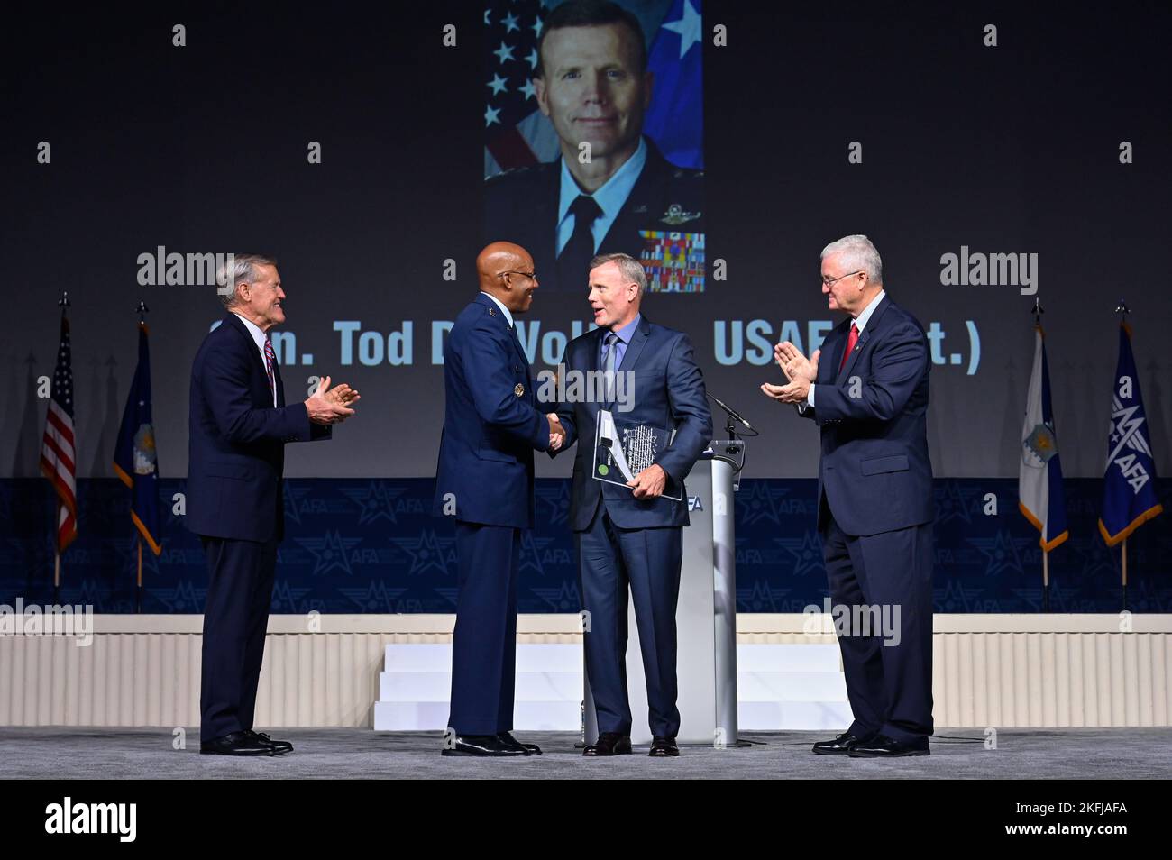 Air Force Chief of Staff Gen. CQ Brown, Jr., center left, congratulates ...