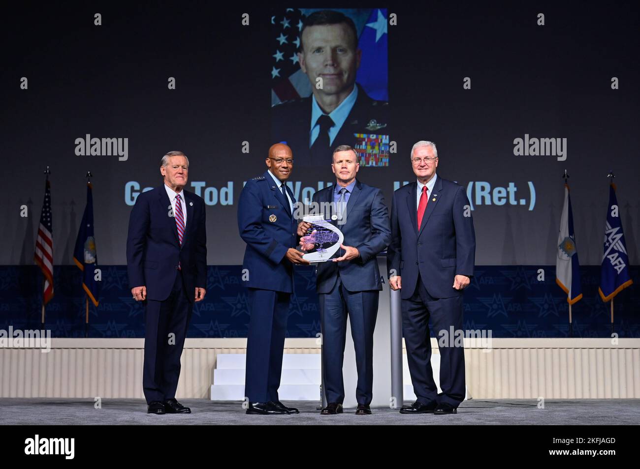 Air Force Chief of Staff Gen. CQ Brown, Jr., center left, poses with ...