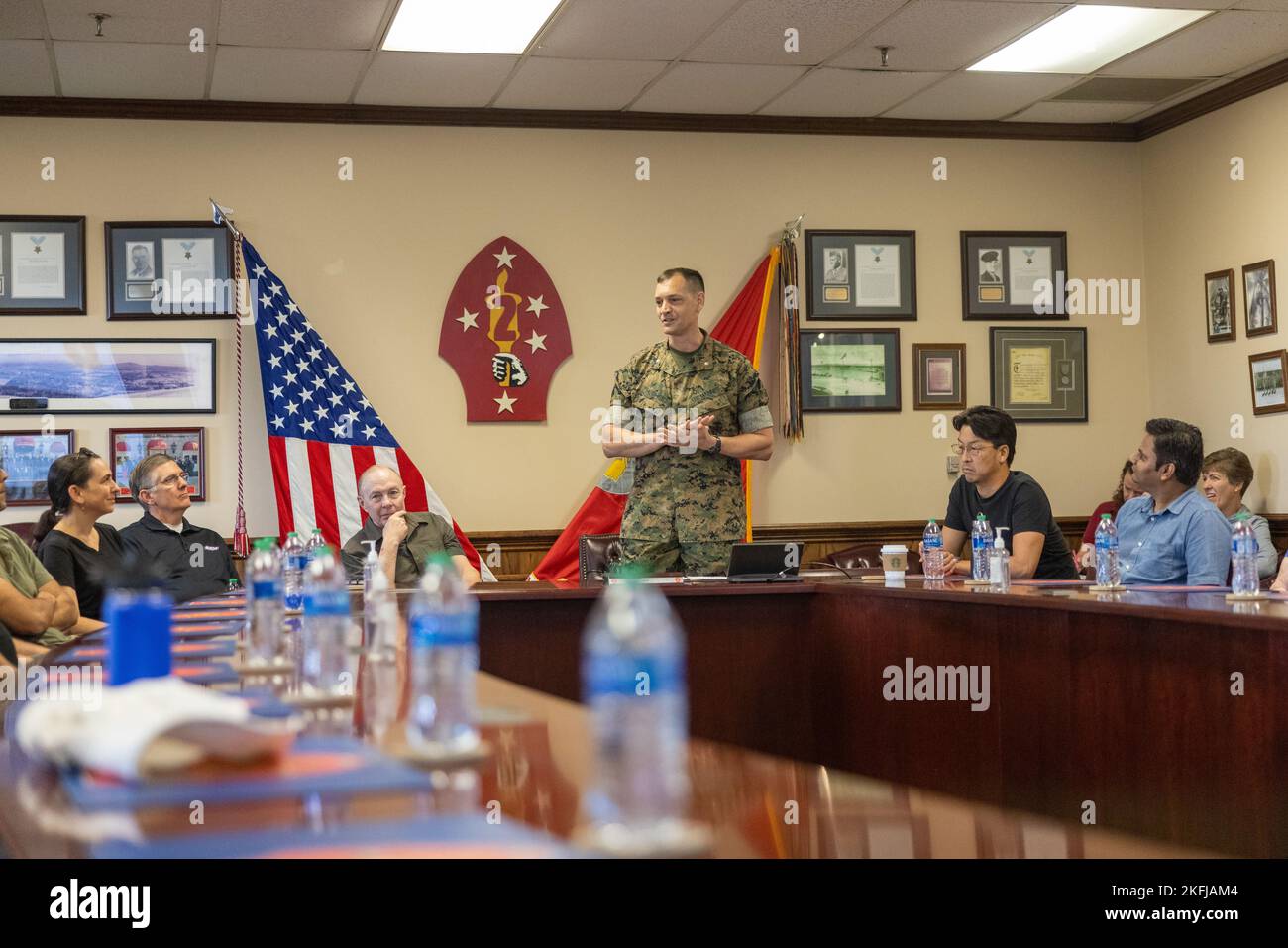 Members of the Defense Science Study Group receive a brief from U.S ...