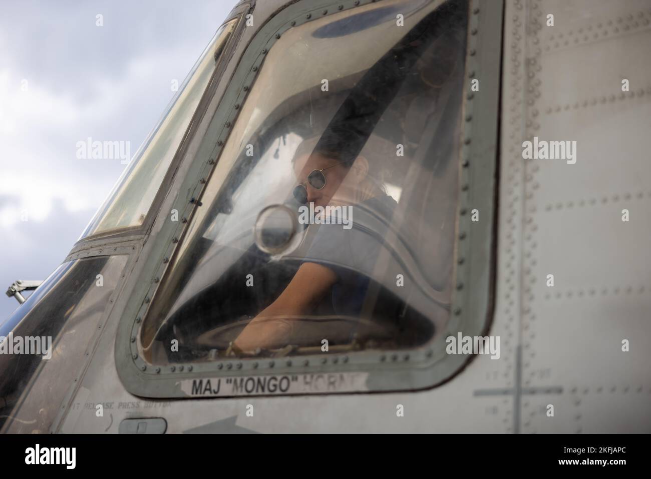 Members of the Defense Science Study Group receive a brief from a U.S ...