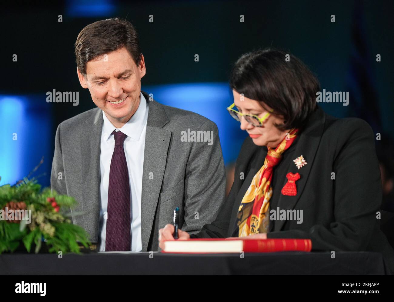 B.C. Premier David Eby smiles as Lt-Gov. Janet Austin signs documents ...