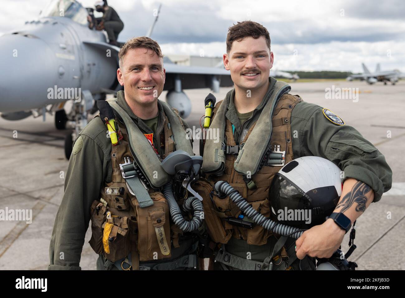 U.S. Marine Corps Maj. Joshua Martin, left, executive officer, Marine ...
