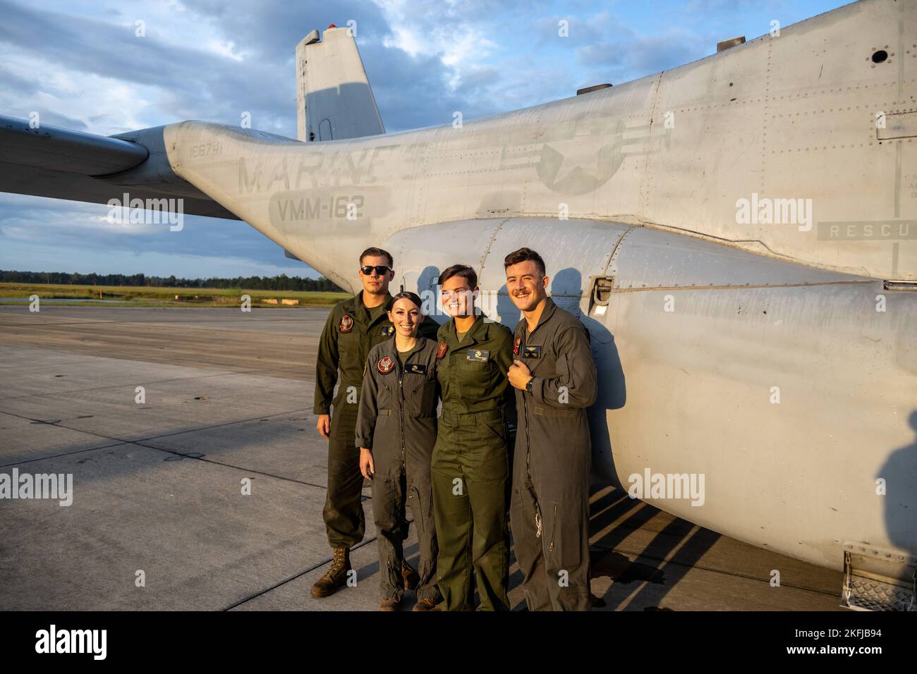 U.S. Marines with Marine Medium Tiltrotor Squadron (VMM) 162 pose for a ...