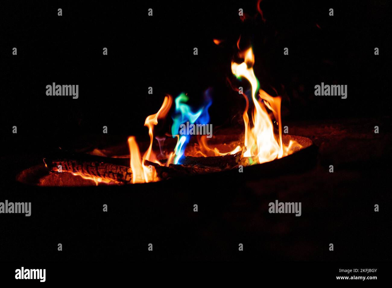 A closeup shot of a bonfire at a camp Stock Photo - Alamy