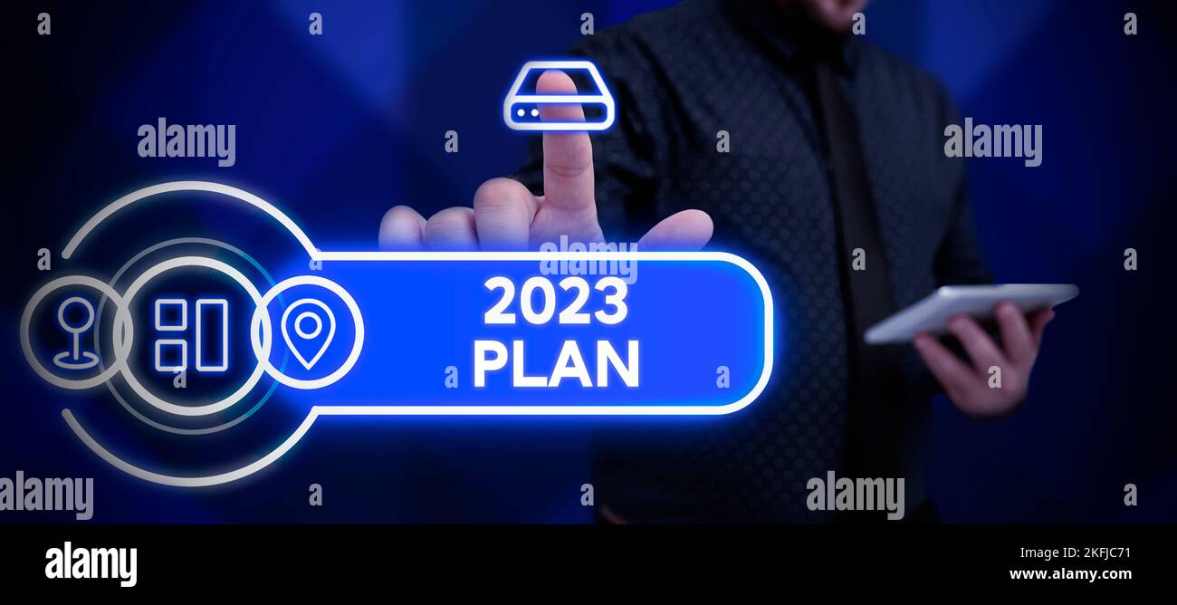 Hand writing sign 2023 Plan. Conceptual photo setting up your goals and ...