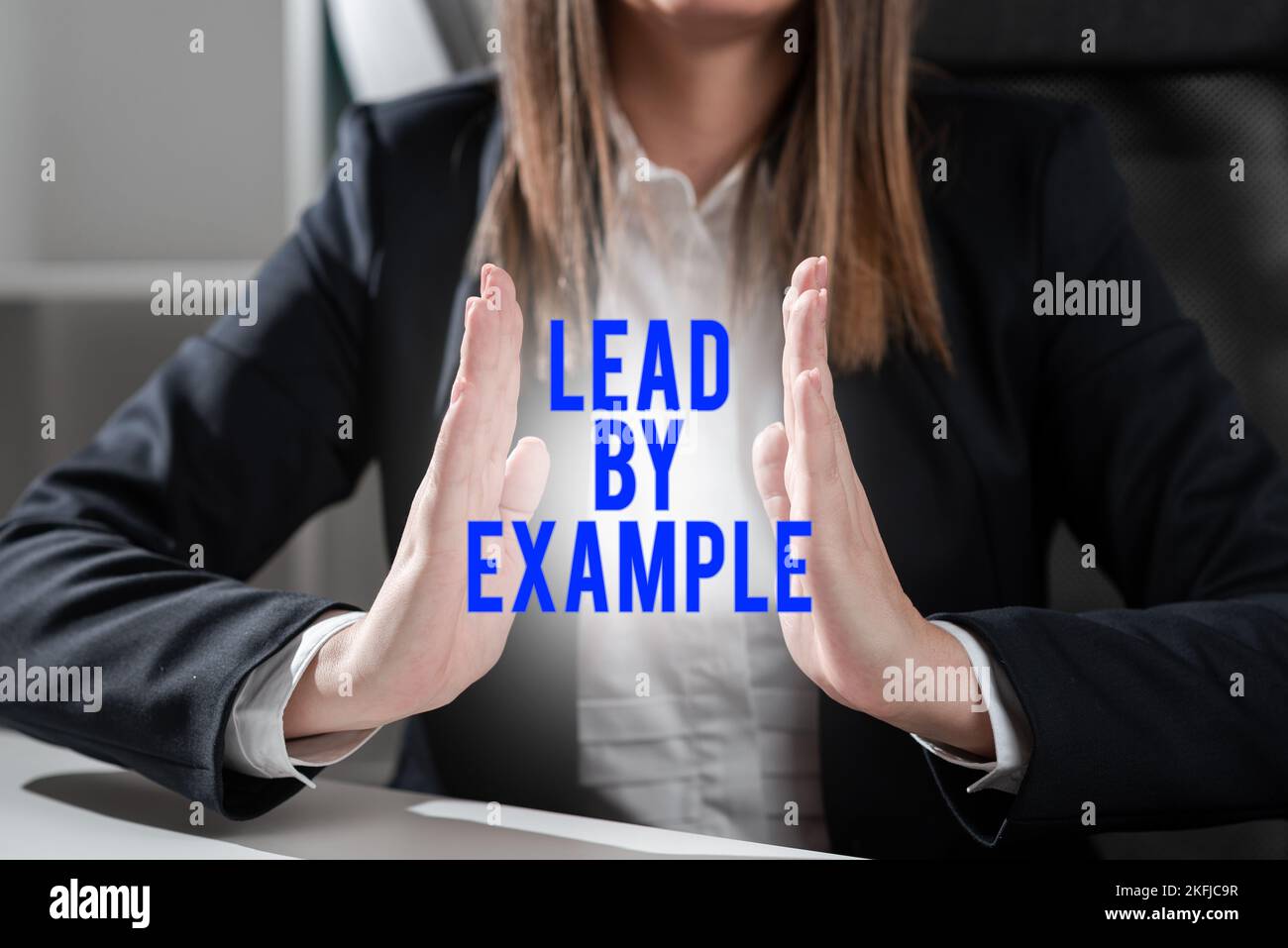 Hand writing sign Lead By Example. Concept meaning Be a mentor leader ...