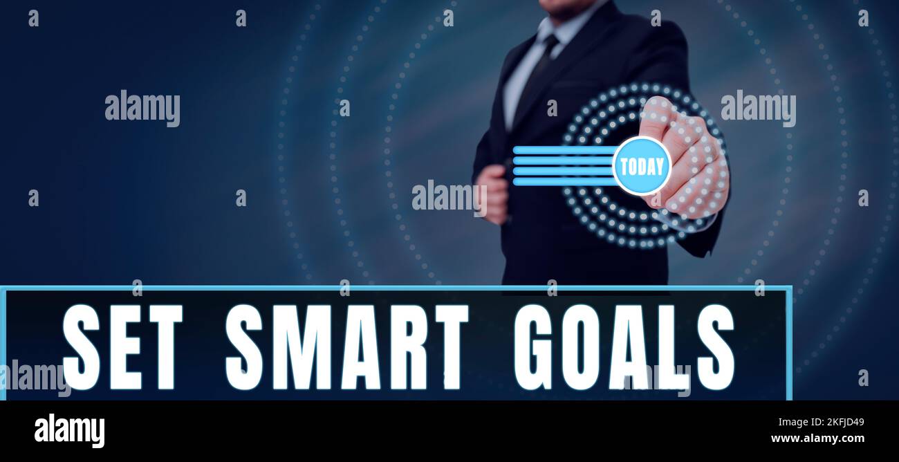 Hand writing sign Set Smart Goals. Conceptual photo Establish ...