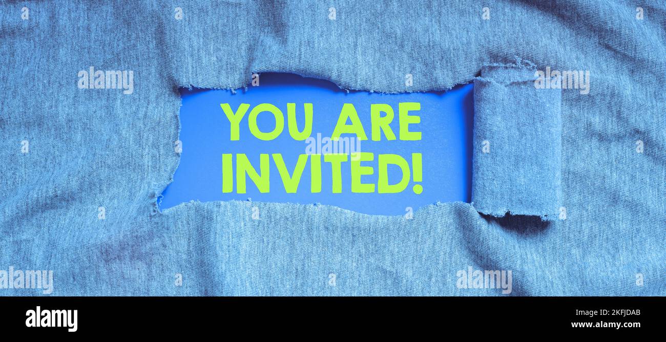 Hand writing sign You Are Invited. Word Written on Receiving and ...
