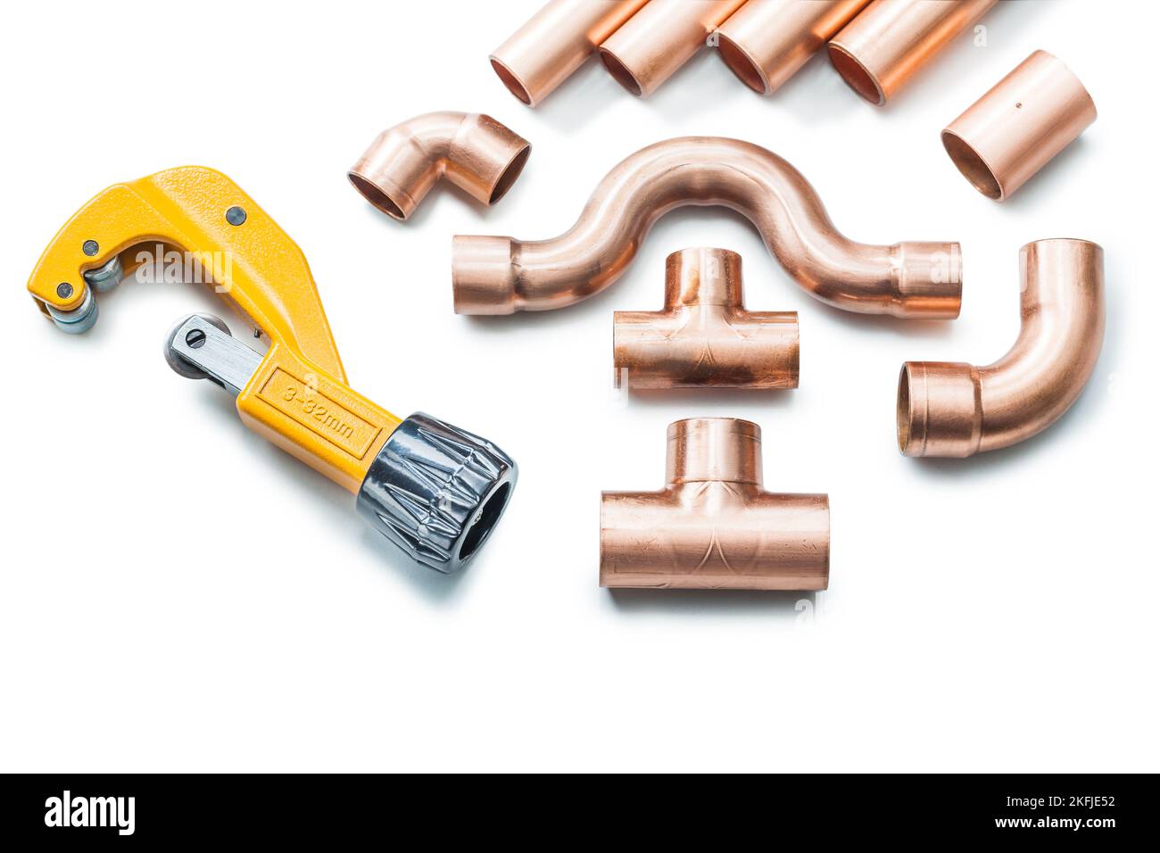 copper pipe and fittings with pipecutter isolated on white Stock Photo ...