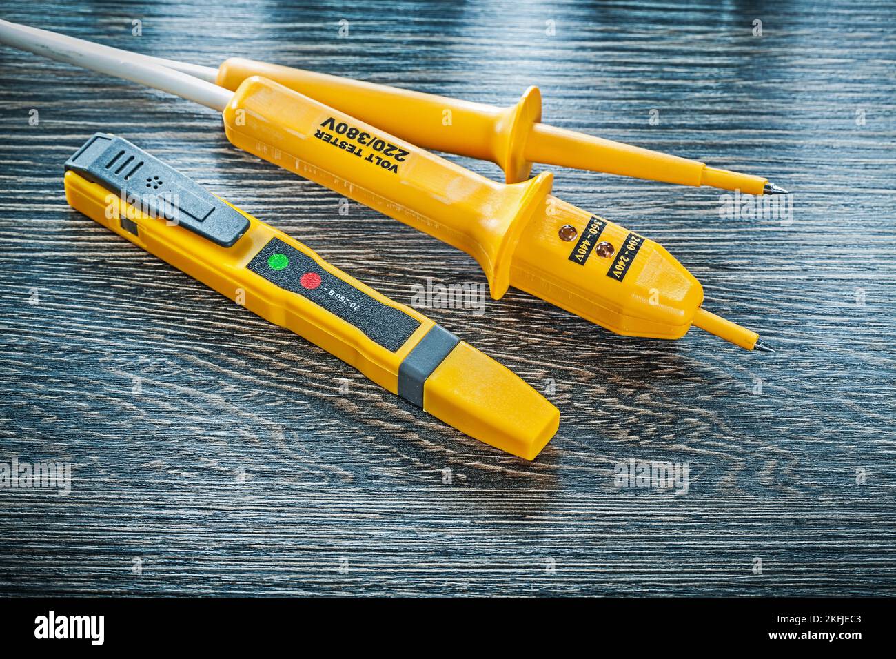 Electrical testers on wood board horizontal image electricity concept ...