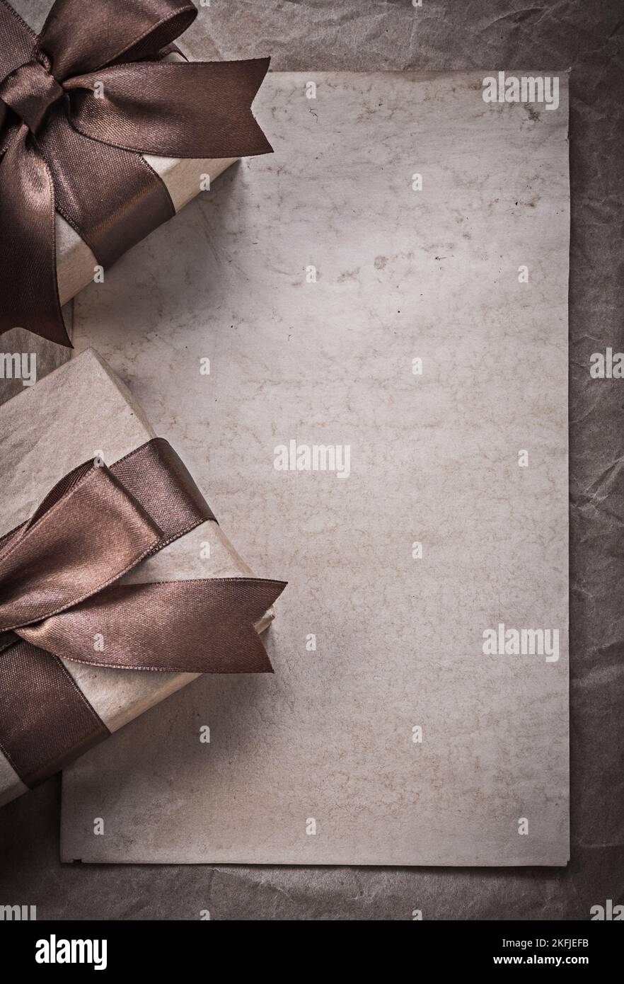 Gift boxes sheet of wrapping paper celebration concept Stock Photo - Alamy