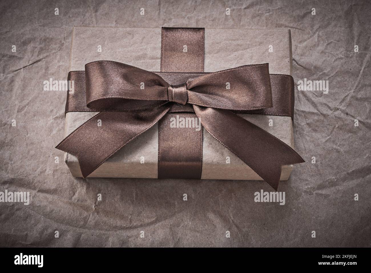 Giftbox with present tape on wrapping paper holidays concept Stock ...