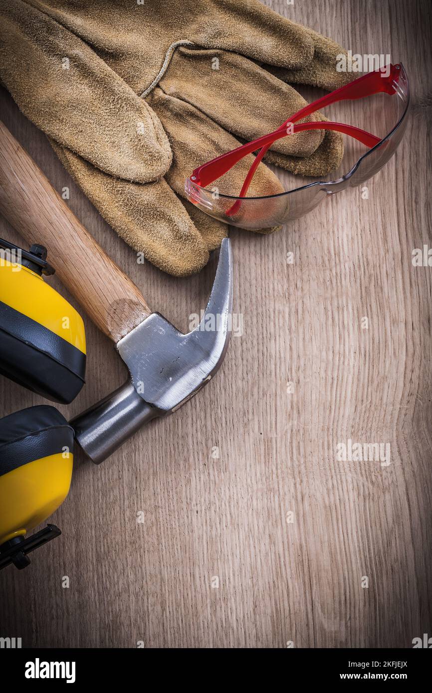 Group of safety working tools and hammer close up view Stock Photo - Alamy