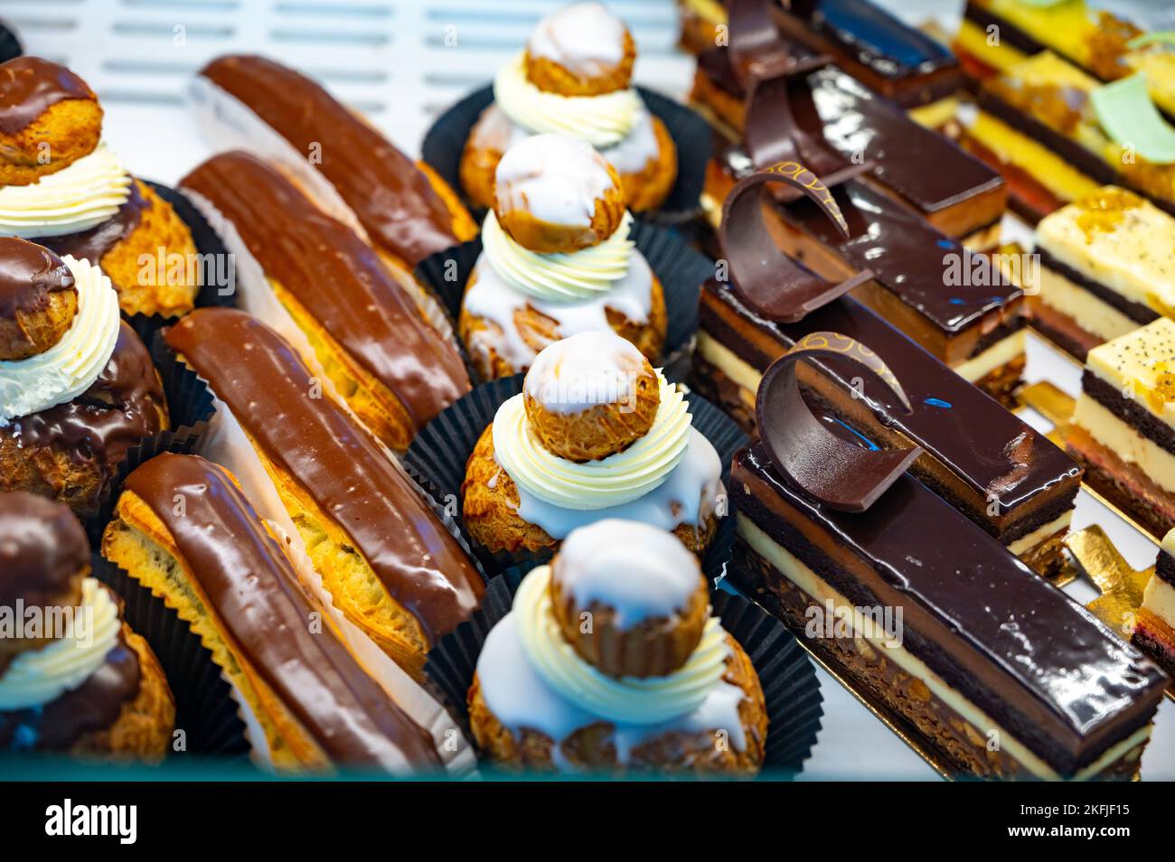 Assortment of french fresh baked sweet pastry with fresh fruits and ...