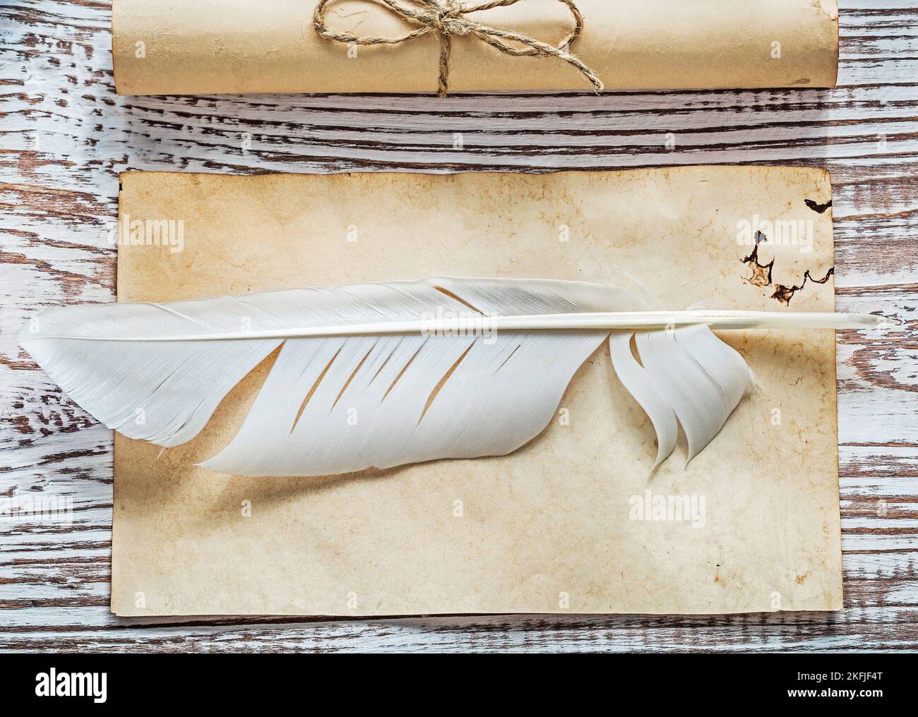 Medieval parchment corded paper rolls quill on vintage wood board Stock ...