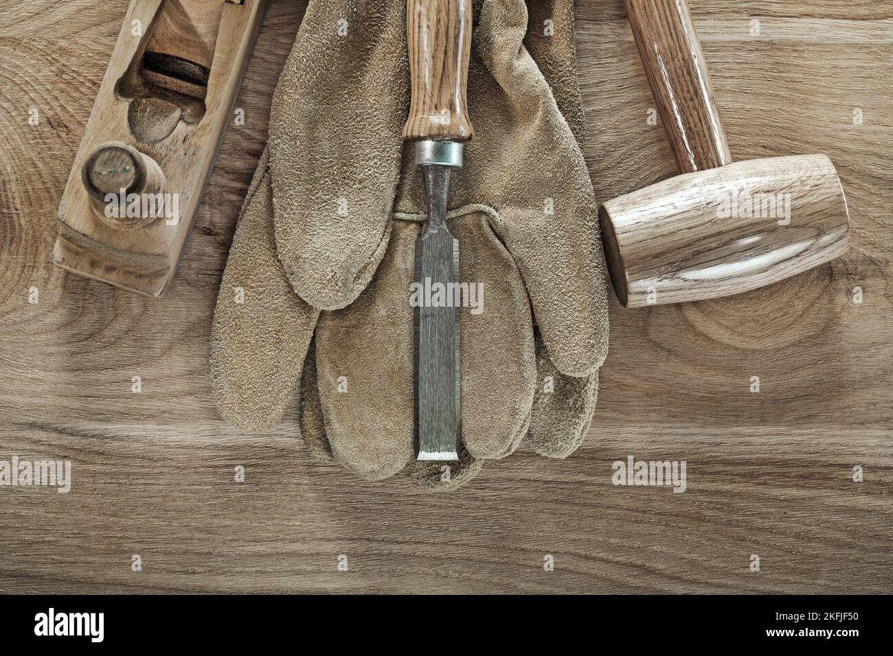 Lump hammer planer chisel safety gloves on wooden board Stock Photo - Alamy
