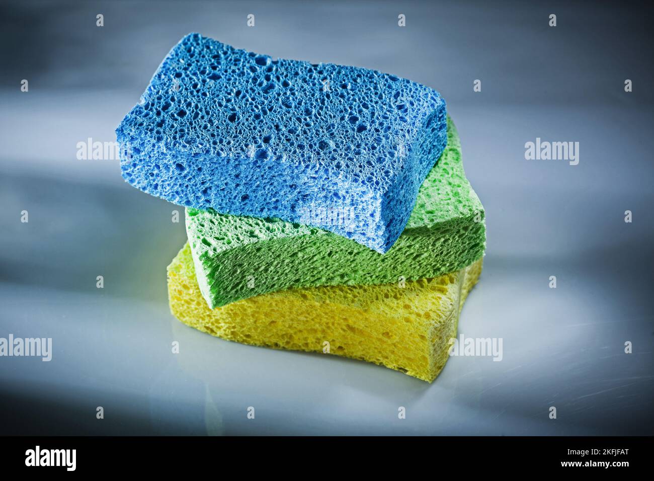 New sponges on white background Stock Photo - Alamy