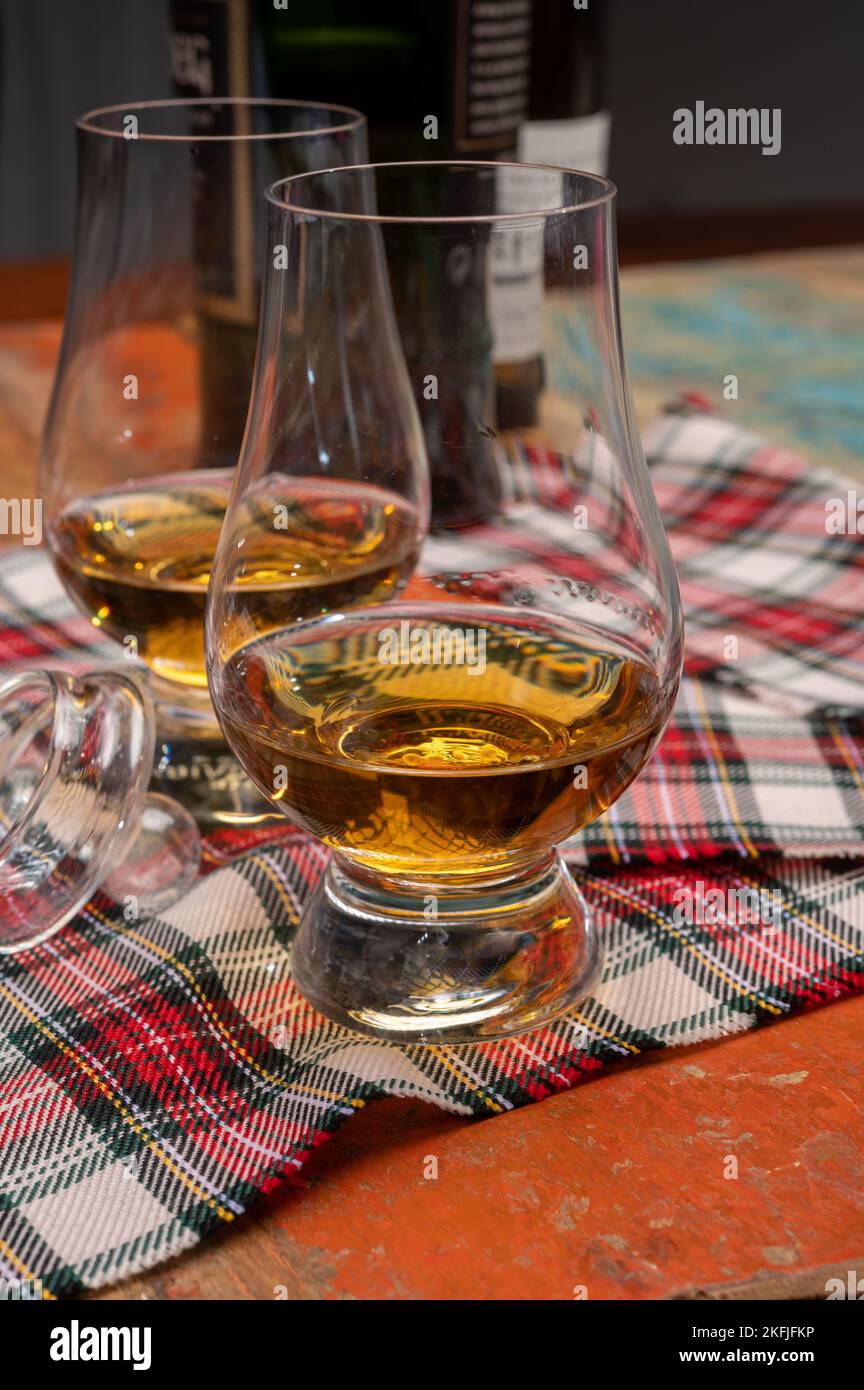 Tulip-shaped tasting glass with dram of Scotch single malt or blended ...