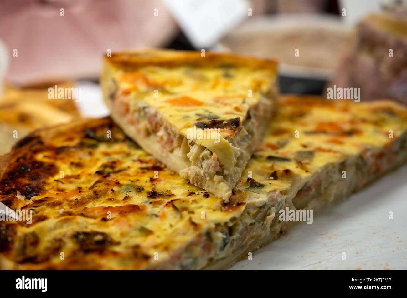 Traditional French quiche vegetable pie with green courgette and carrot ...