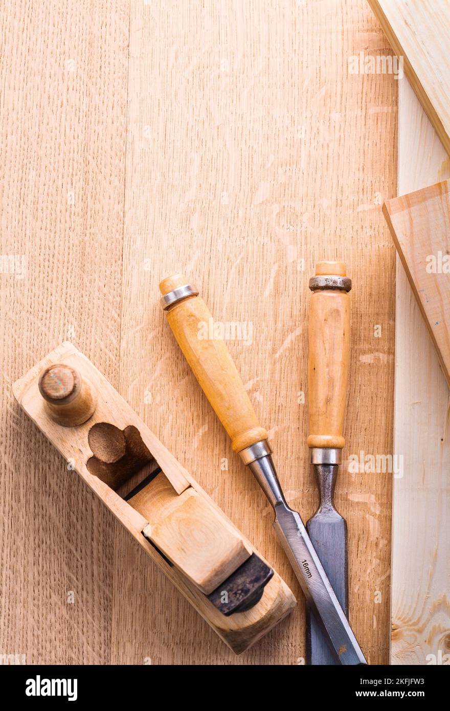 plane and chisels on wooden board Stock Photo - Alamy