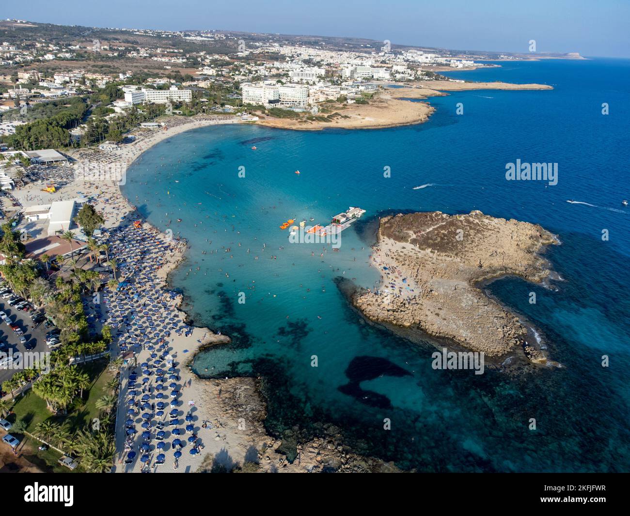 Aerial panoramic view on holidays villas and resorts and blue crystal ...