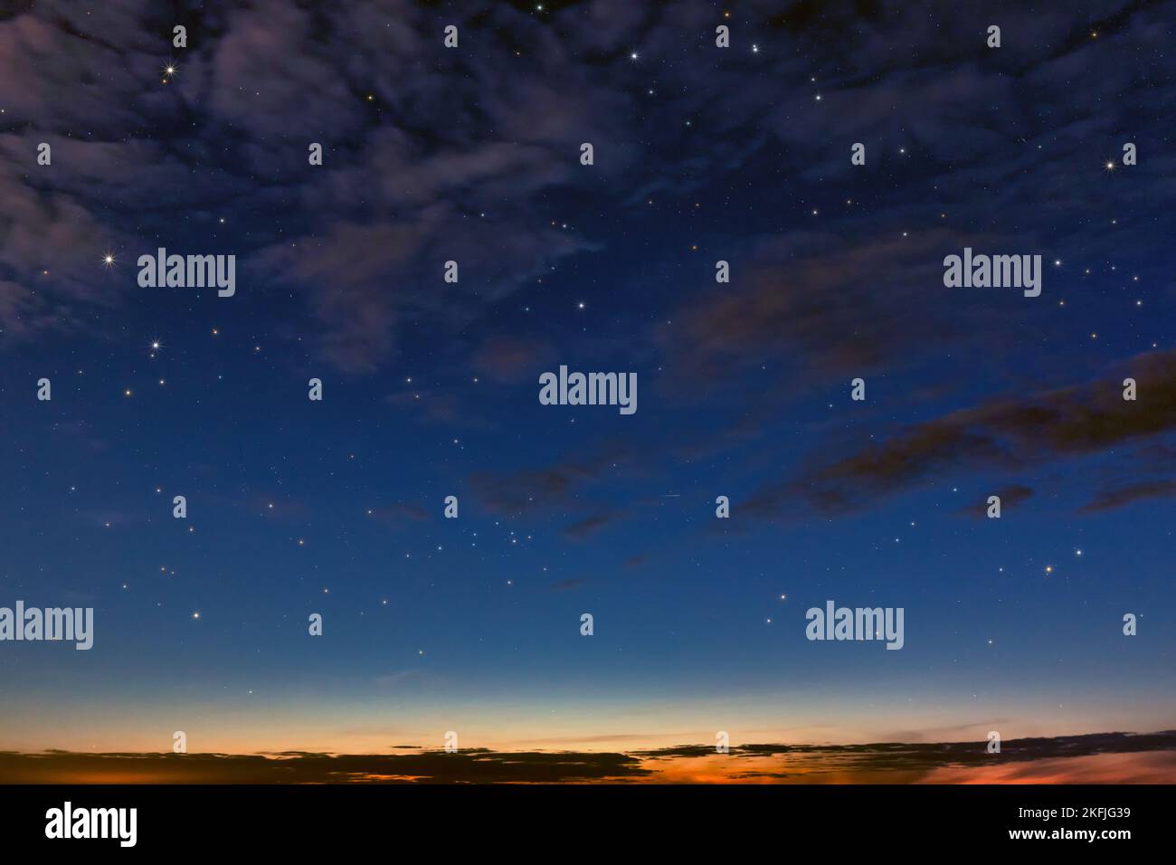 evening sky, day turns to night. Sunset, clouds and starry sky. A ...