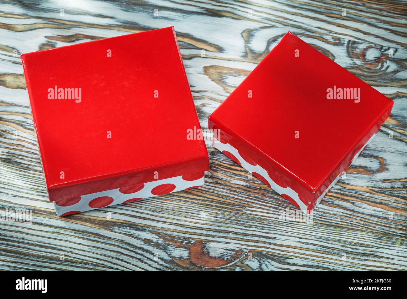 Red present boxes on wooden background Stock Photo - Alamy