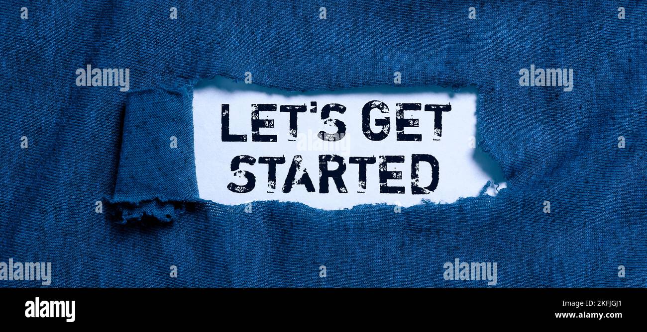 Hand writing sign Let's Get Started. Business approach To begin doing ...