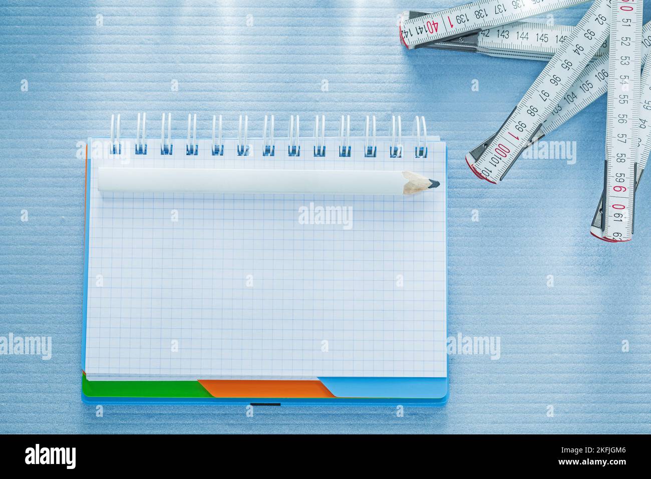Squared notepad pencil tape measure construction concept Stock Photo ...