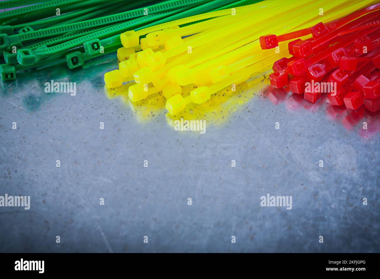 Stack of plastic cable ties on metallic background copy space Stock ...