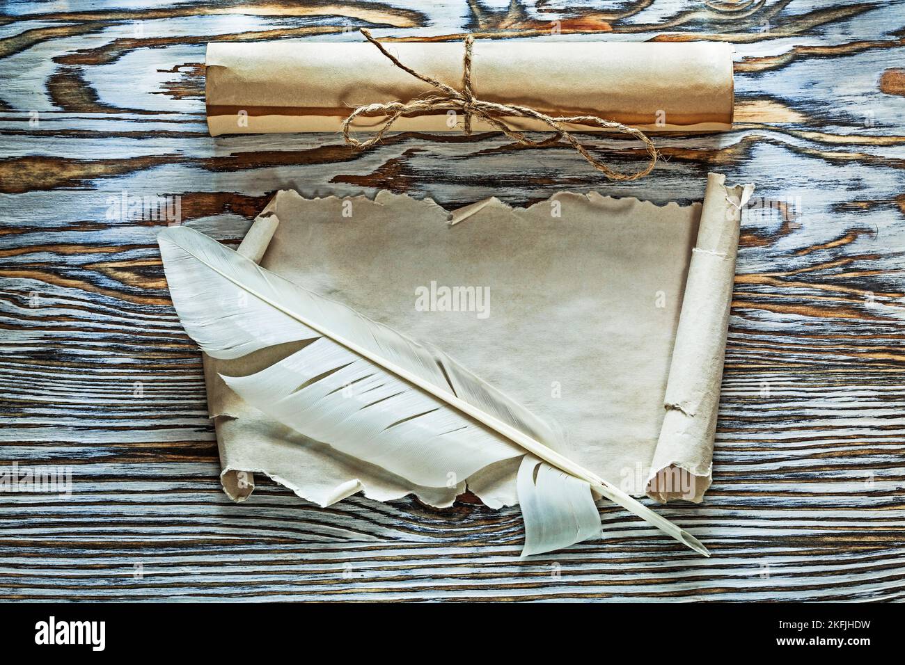Vintage paper scrolls blank document plume on wooden board Stock Photo ...