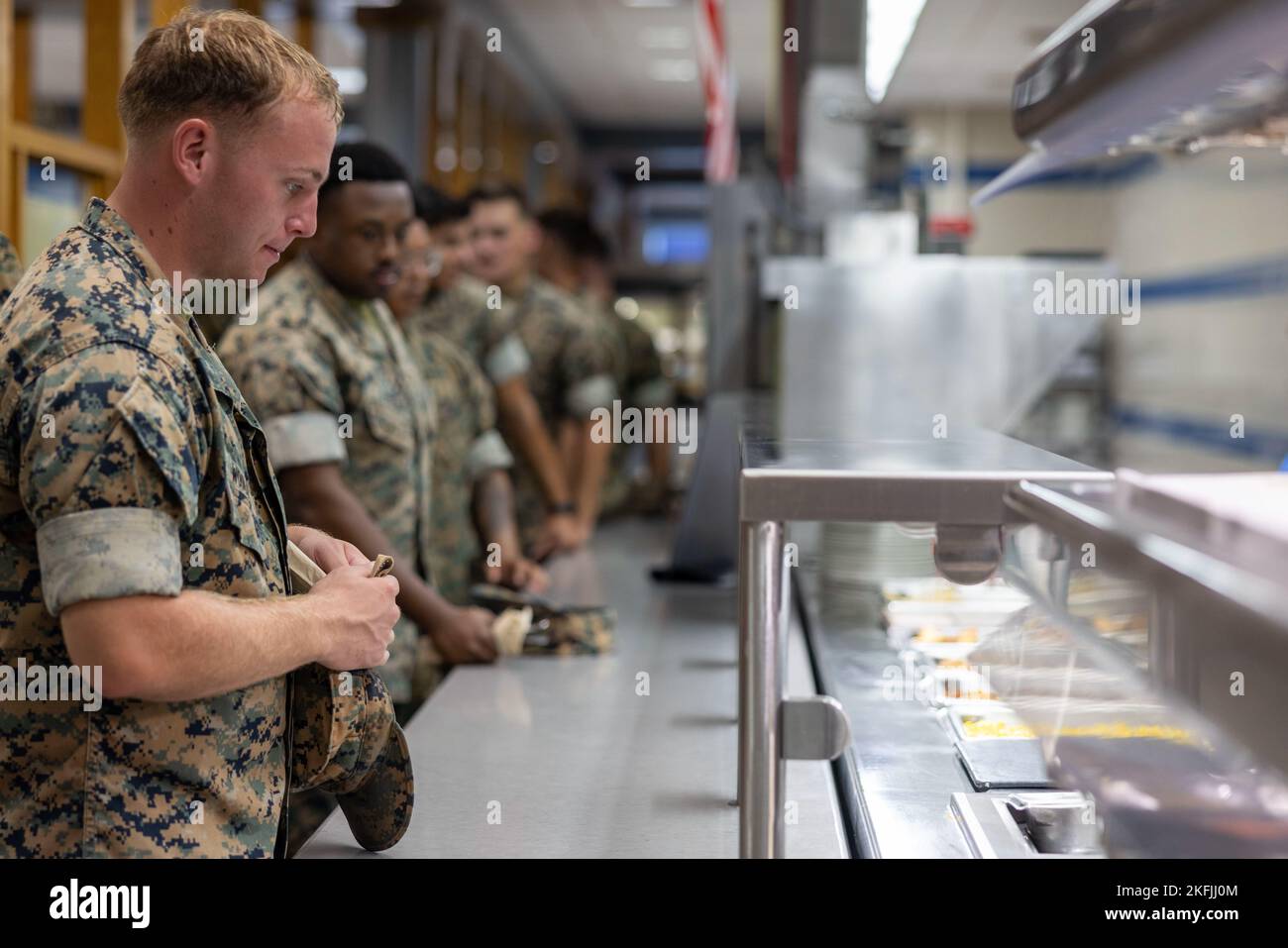 U.S. Marine Corps Lance Cpl. Brian Woolsey, a motor vehicle operator ...