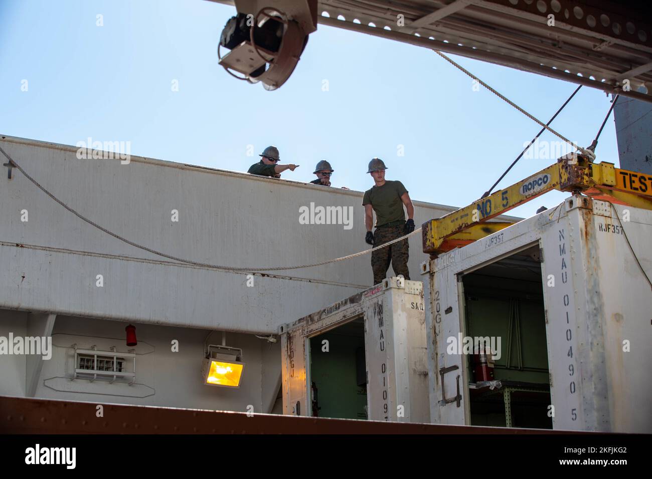 U.S. Marine Corps Gunnery Sgt. Zachary Pipher (left), a mobile-facility ...