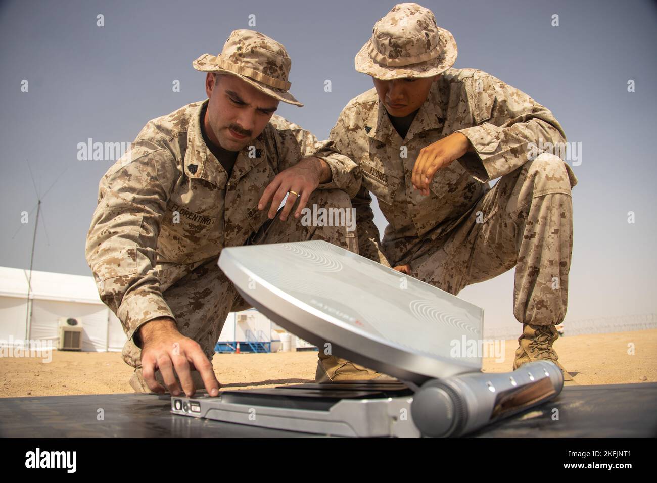 U.S. Marines Sgt. Jonathan Florentino, a communications chief, and Cpl ...