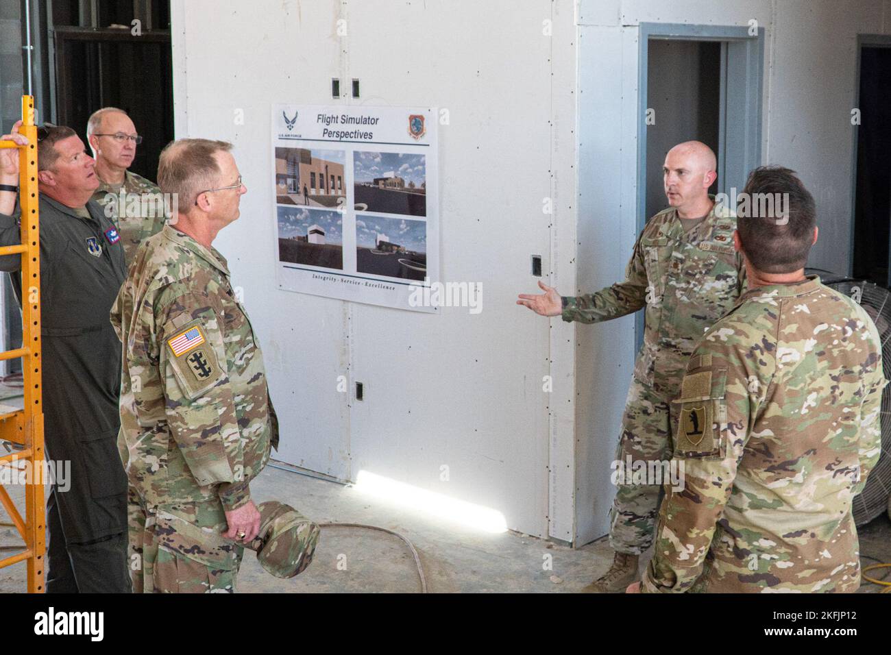 Maj. Matt Neil, commander of the 139th Civil Engineer Squadron, briefs ...