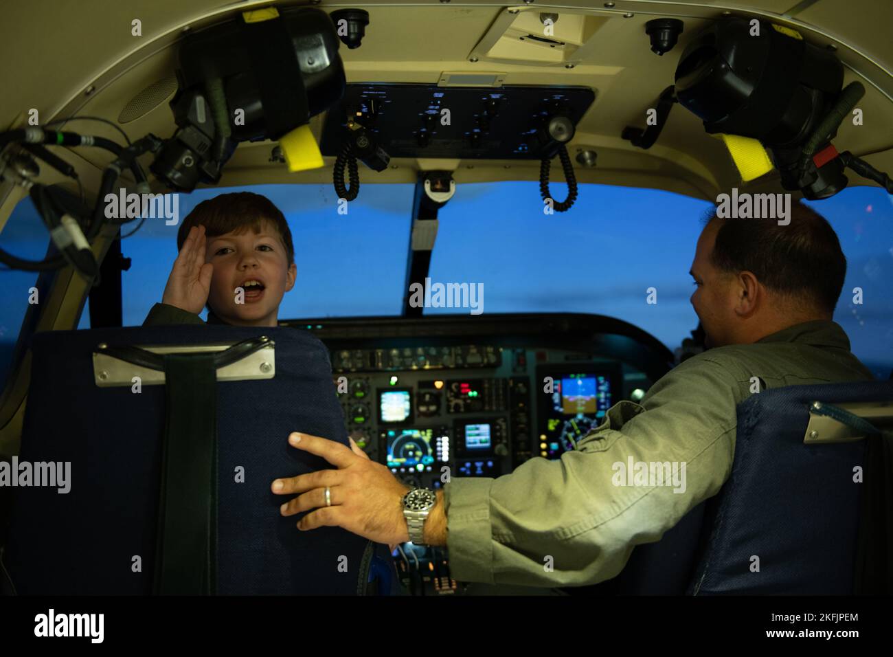 Seth Wilkey, Pilot for a Day, communicates to his crew with Marine ...