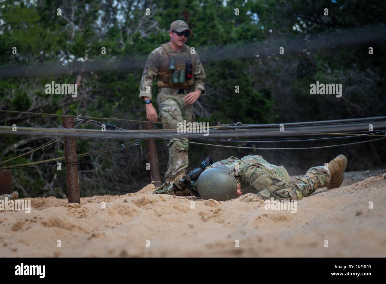 Security Forces trainees at the 343rd Training Squadron move through a ...