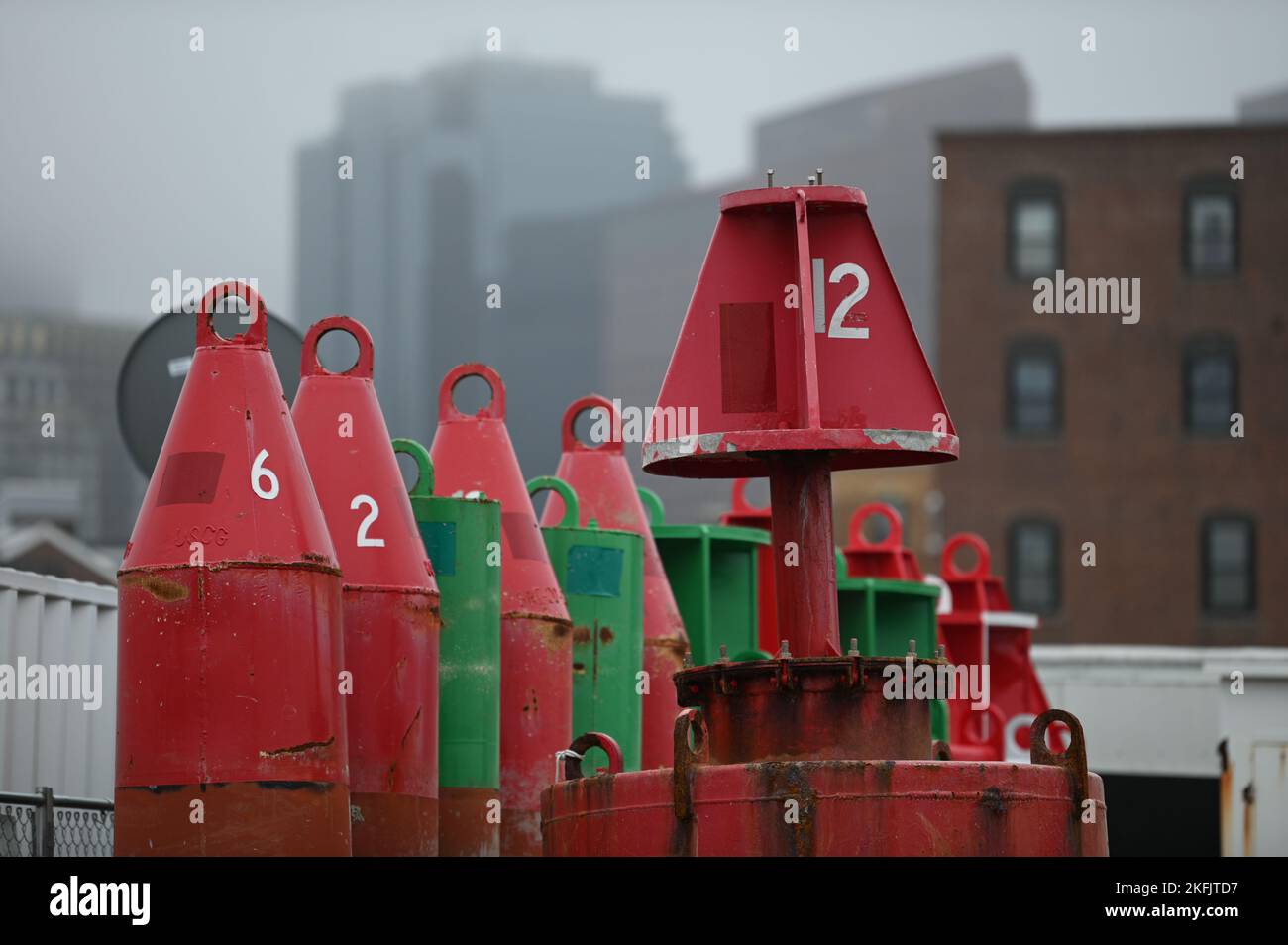 A set of buoys sits on the pier at U.S. Coast Guard Base Boston ...