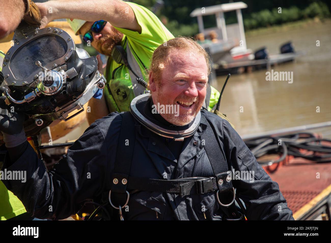 Bryan Smith, Derrick Boat Operator and Dive Supervisor, removing his ...