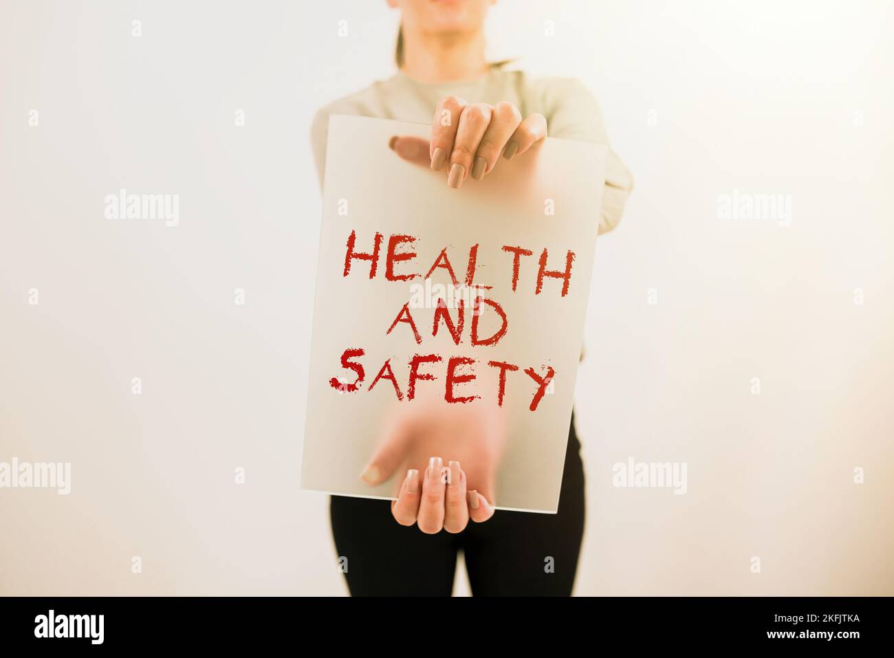 Hand writing sign Health And Safety. Business showcase Taking the ...