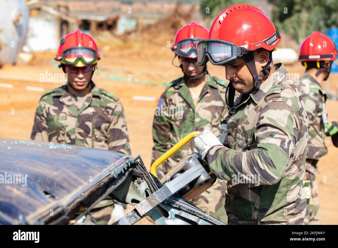 A soldier of the Royal Moroccan Armed Forces, practices how to cut open ...