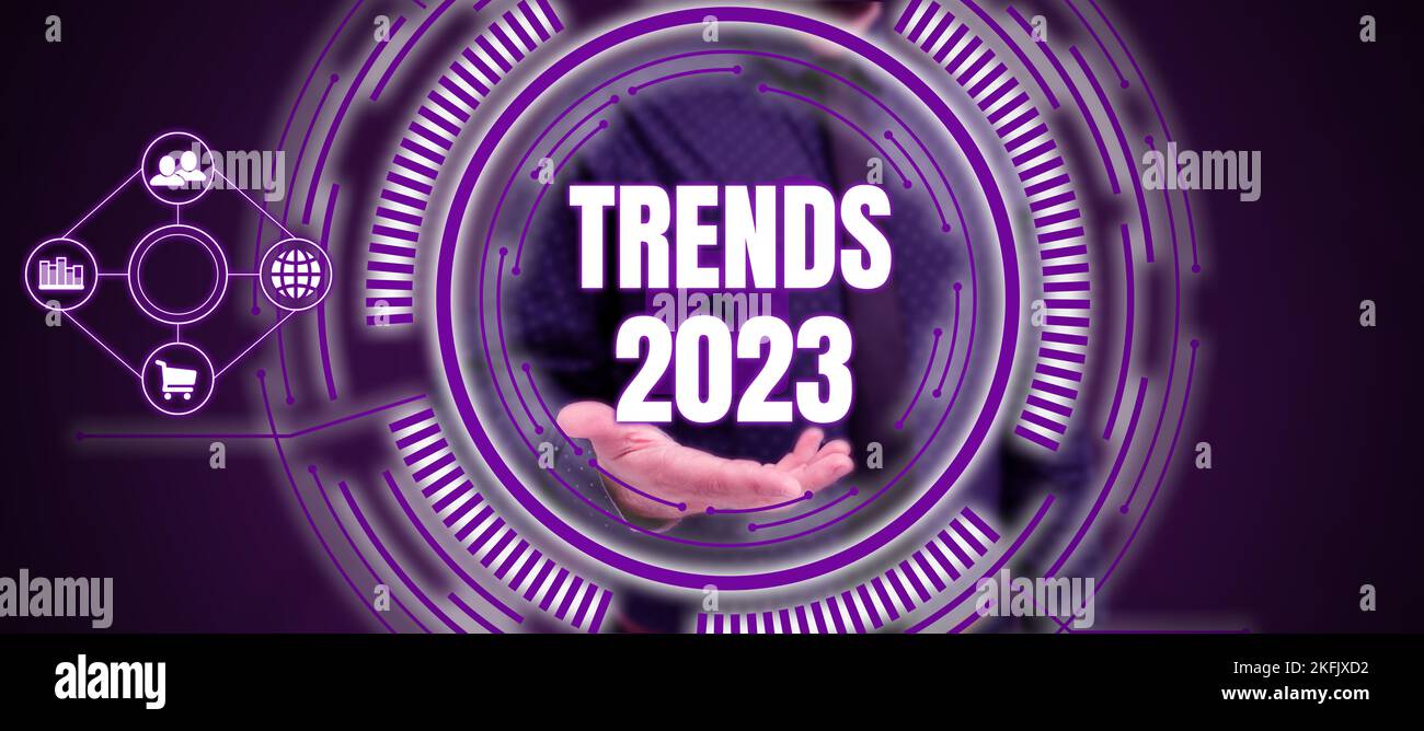 Hand writing sign Trends 2023. Business idea Upcoming year prevailing ...