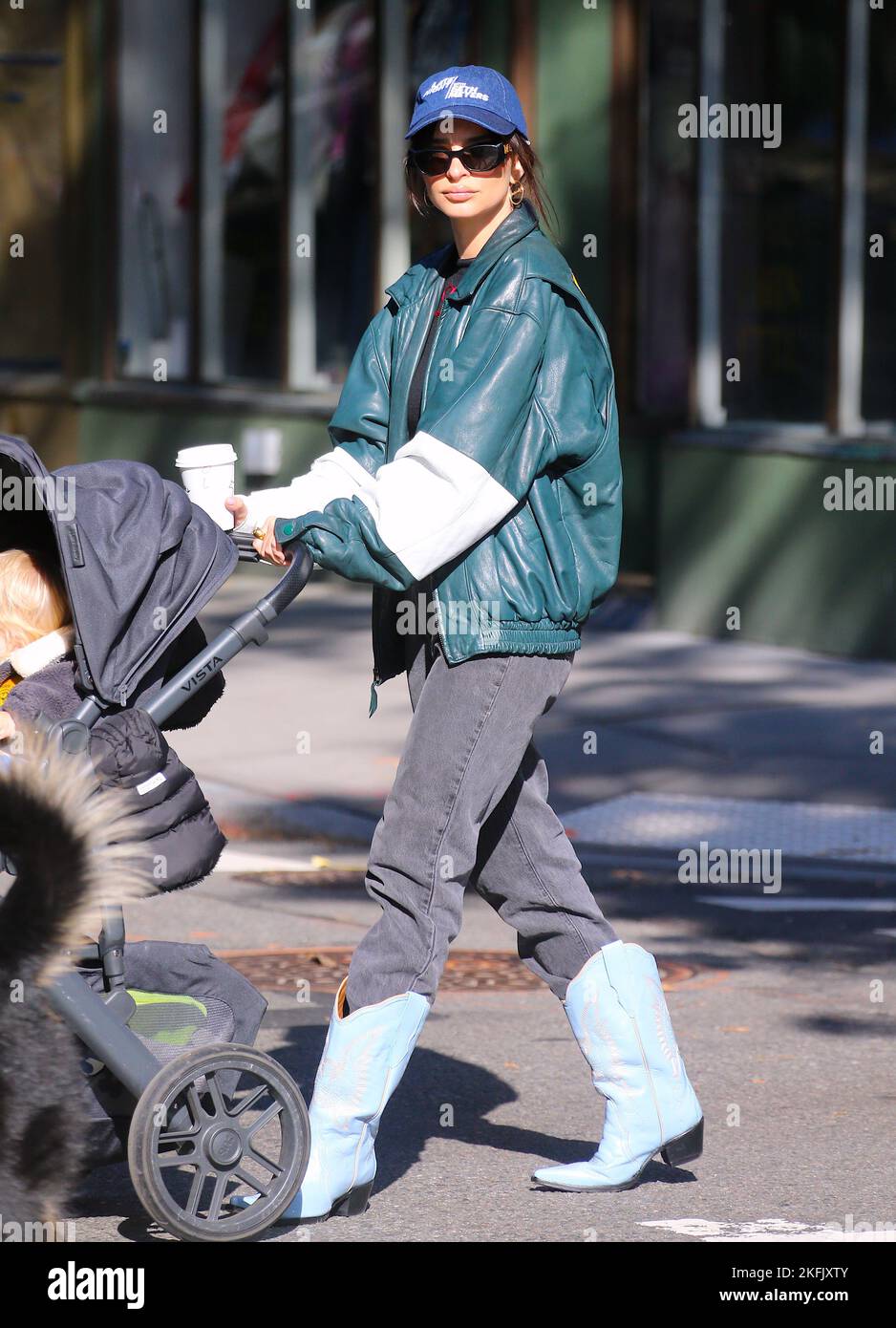 Emily Ratajkowski with her son Sylvester strolling in a cold weather ...