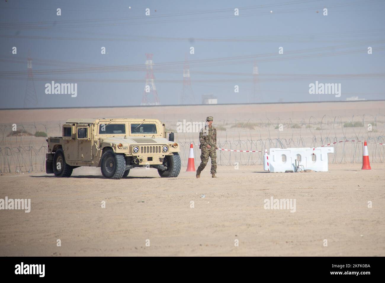 A U.S. Army Soldier with 1st Battalion, 182nd Infantry Regiment guides ...
