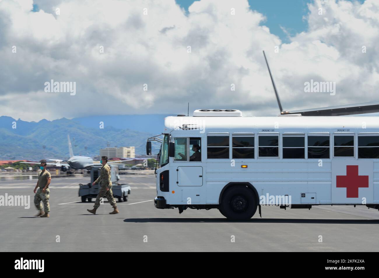 Personnel with the 15th Medical Group provide medical care for an ...