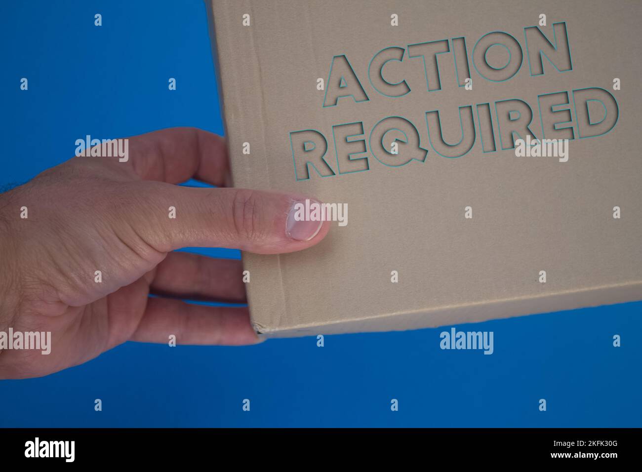 Action Required word with cardboard box. Brown folded card box Stock ...