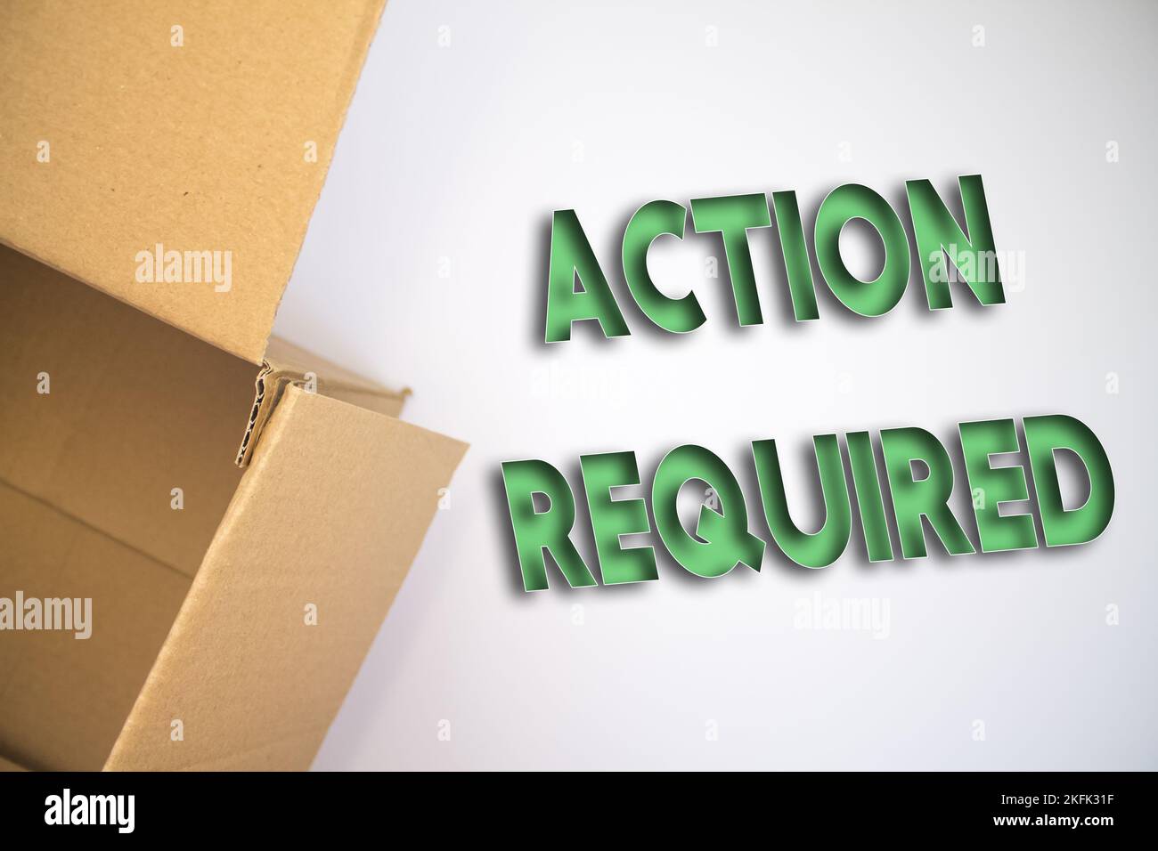Action Required word with cardboard box. Brown folded card box Stock ...