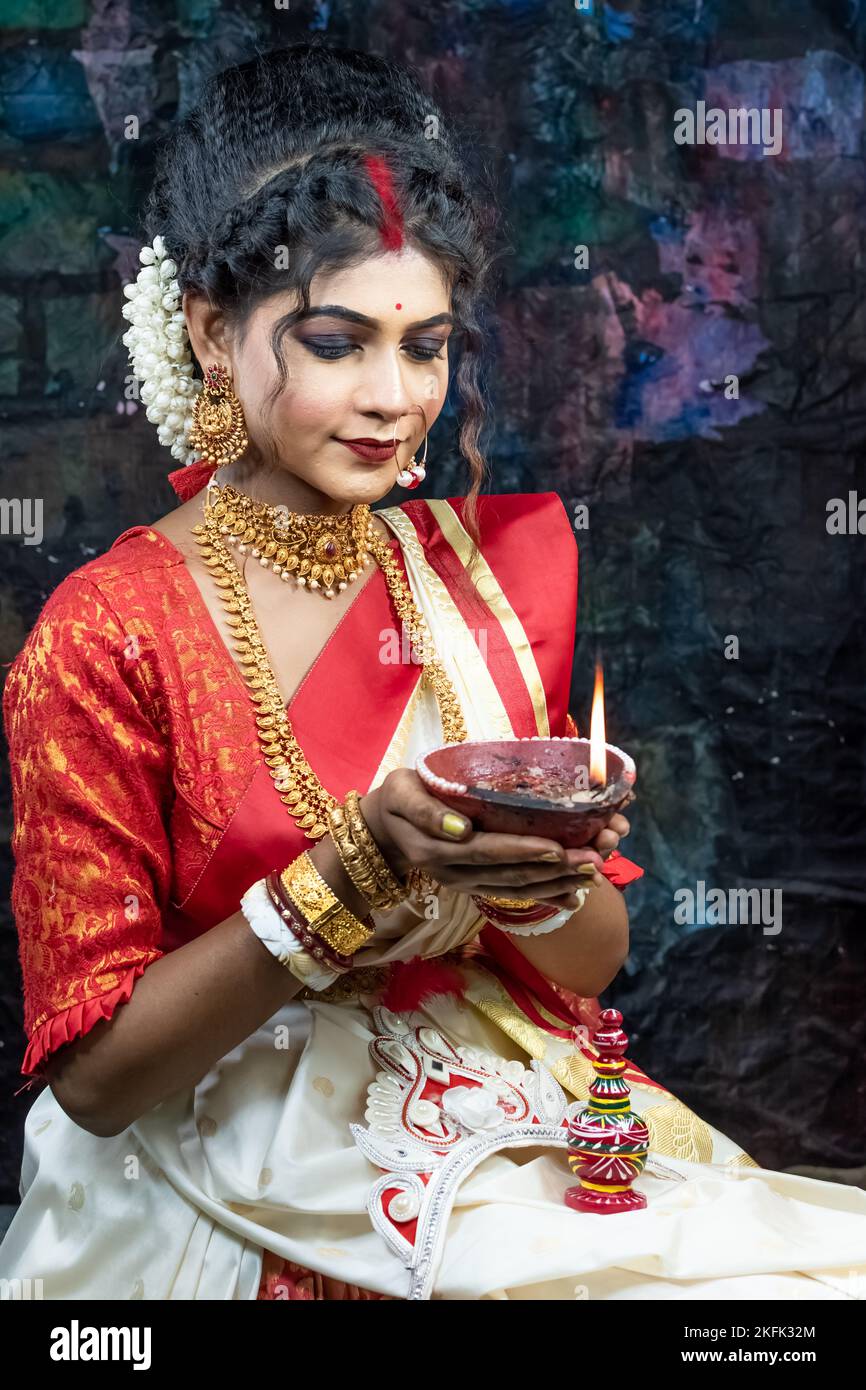 A beautiful woman playing sindur khela on the occasion of vijya dashmi ...