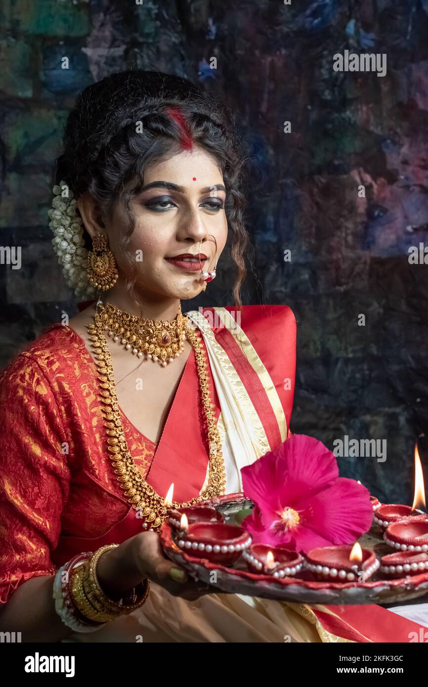 A beautiful woman playing sindur khela on the occasion of vijya dashmi ...